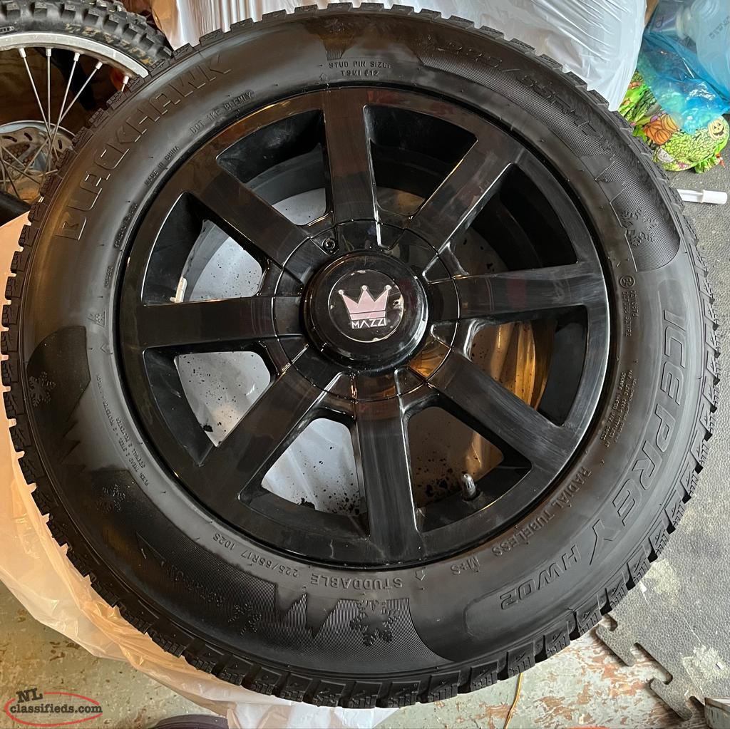 Studded tires on black Mazzi wheels - Badger's Quay, Newfoundland ...